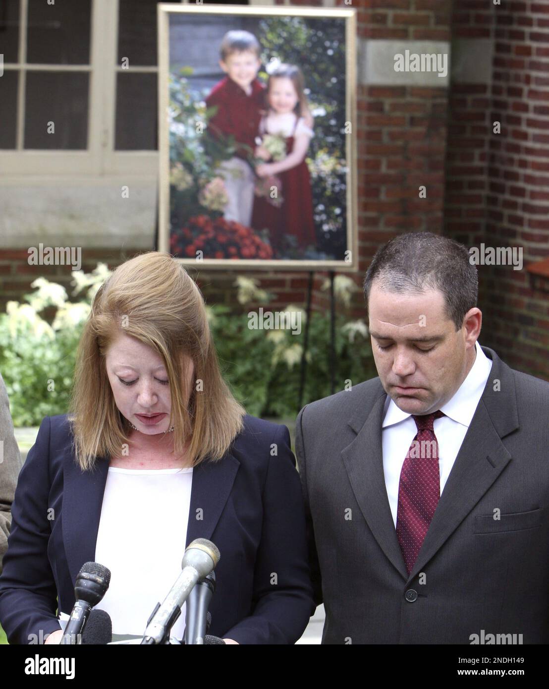 David Sochat, right, listens as his wife Debra, sister of Laura Stone ...