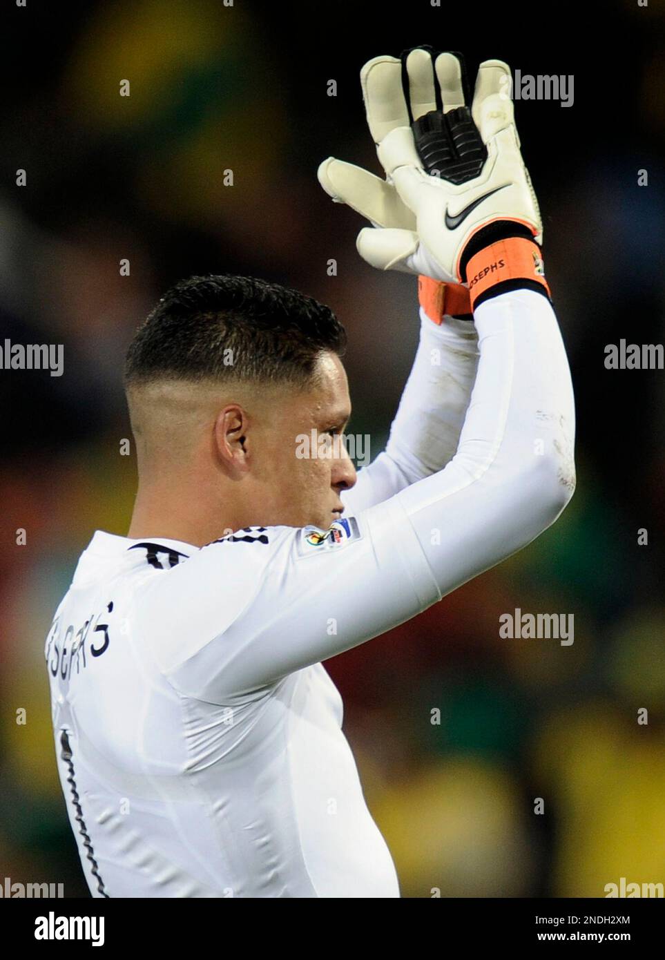 South Africa goalkeeper Moeneeb Josephs applauds following the World ...