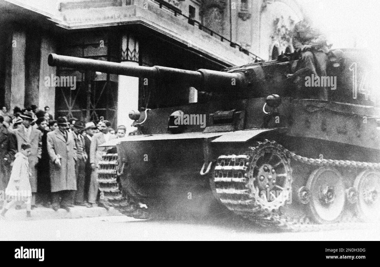 This is heavy German tank rolling through the streets of Tunis, Jan. 11 ...