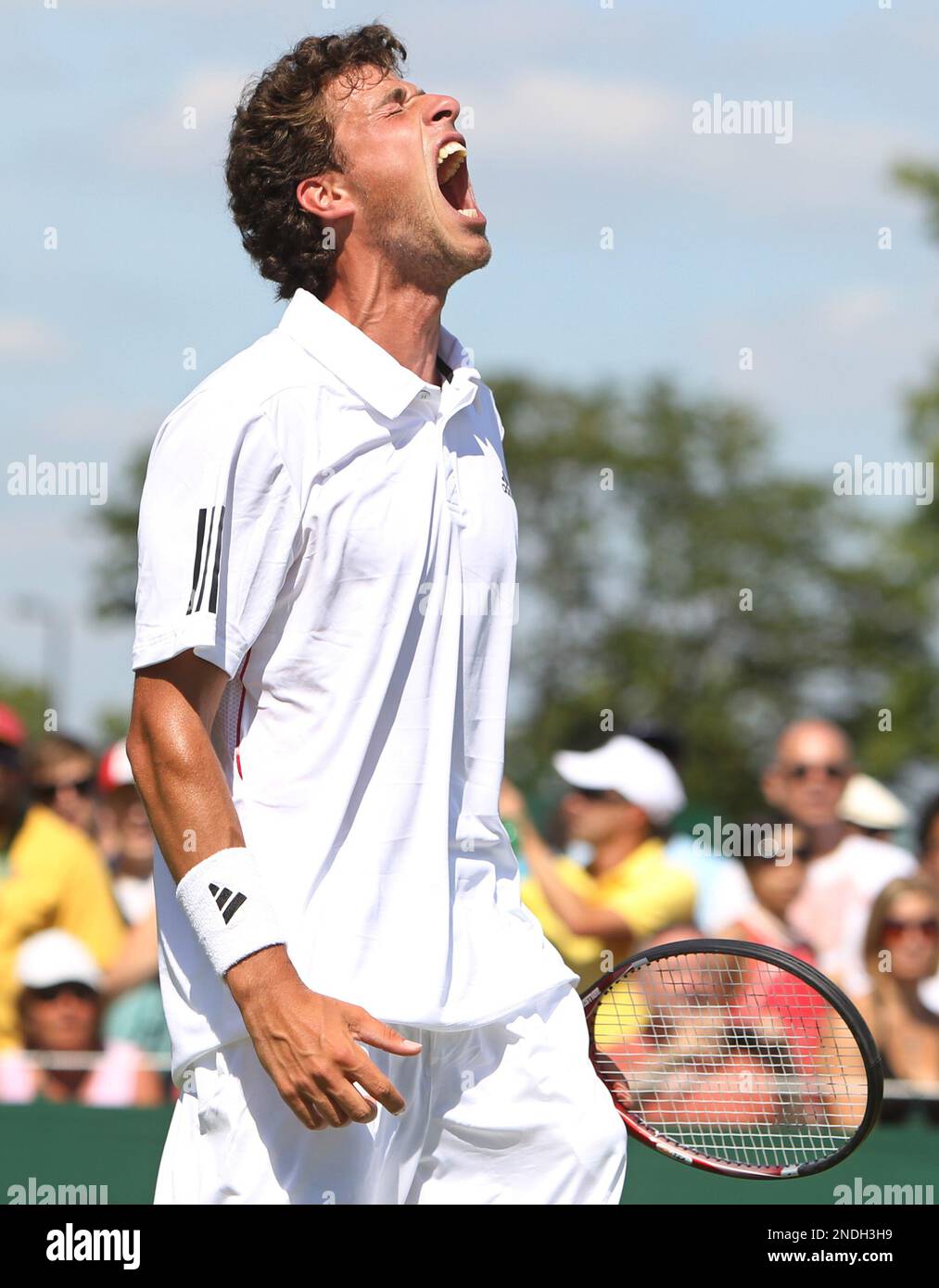 Robin Haase of the Netherlands yells as he celebrates his win over ...
