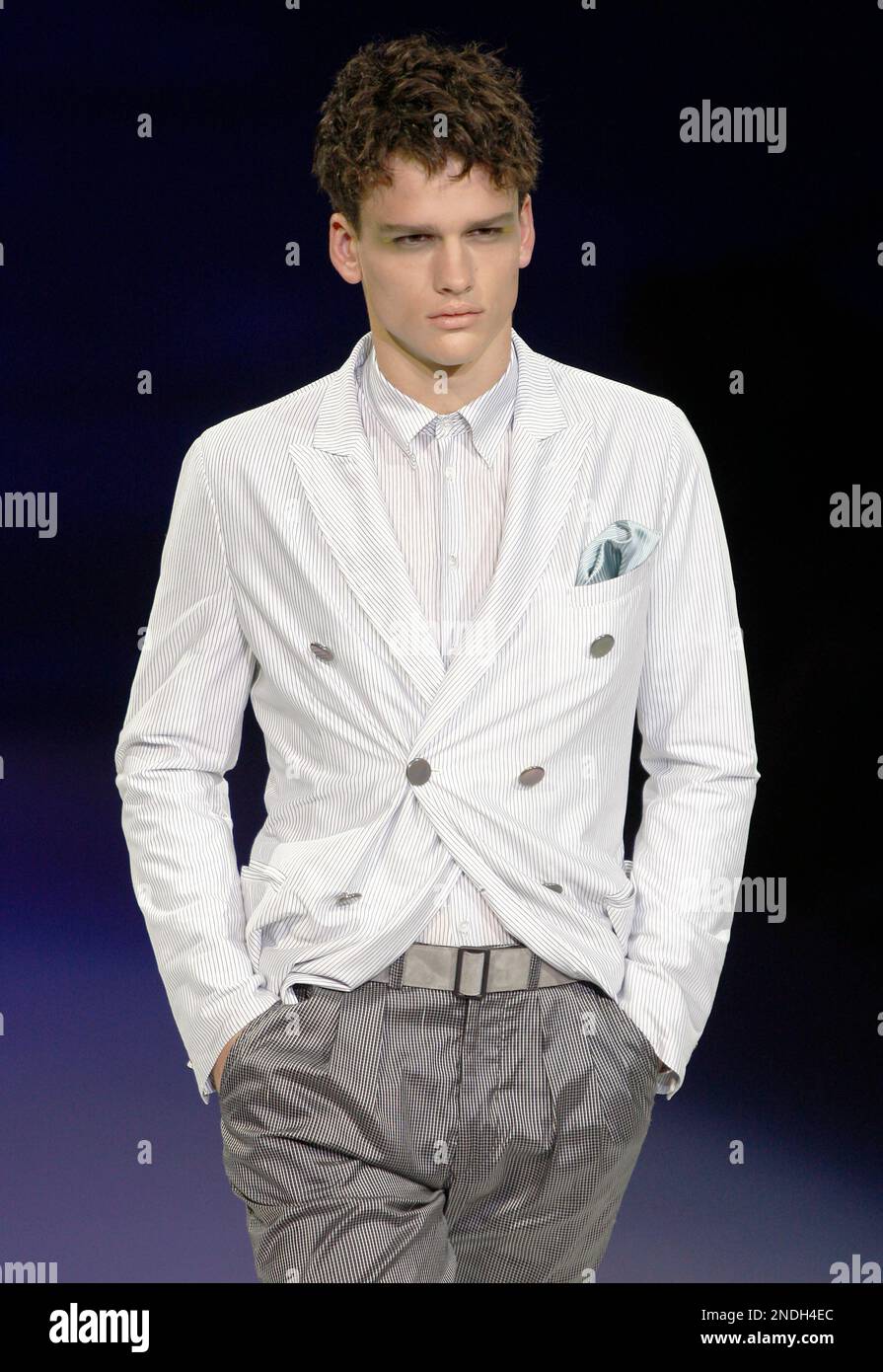 A model wears a creation of Giorgio Armani men's Spring-Summer 2011 ...