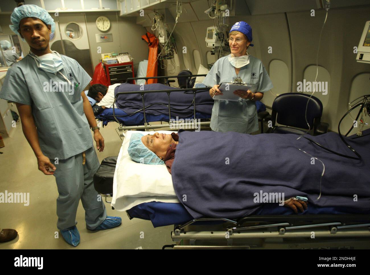 ORBIS staff nurse Pamela Bailey of South Africa, right, and an ...