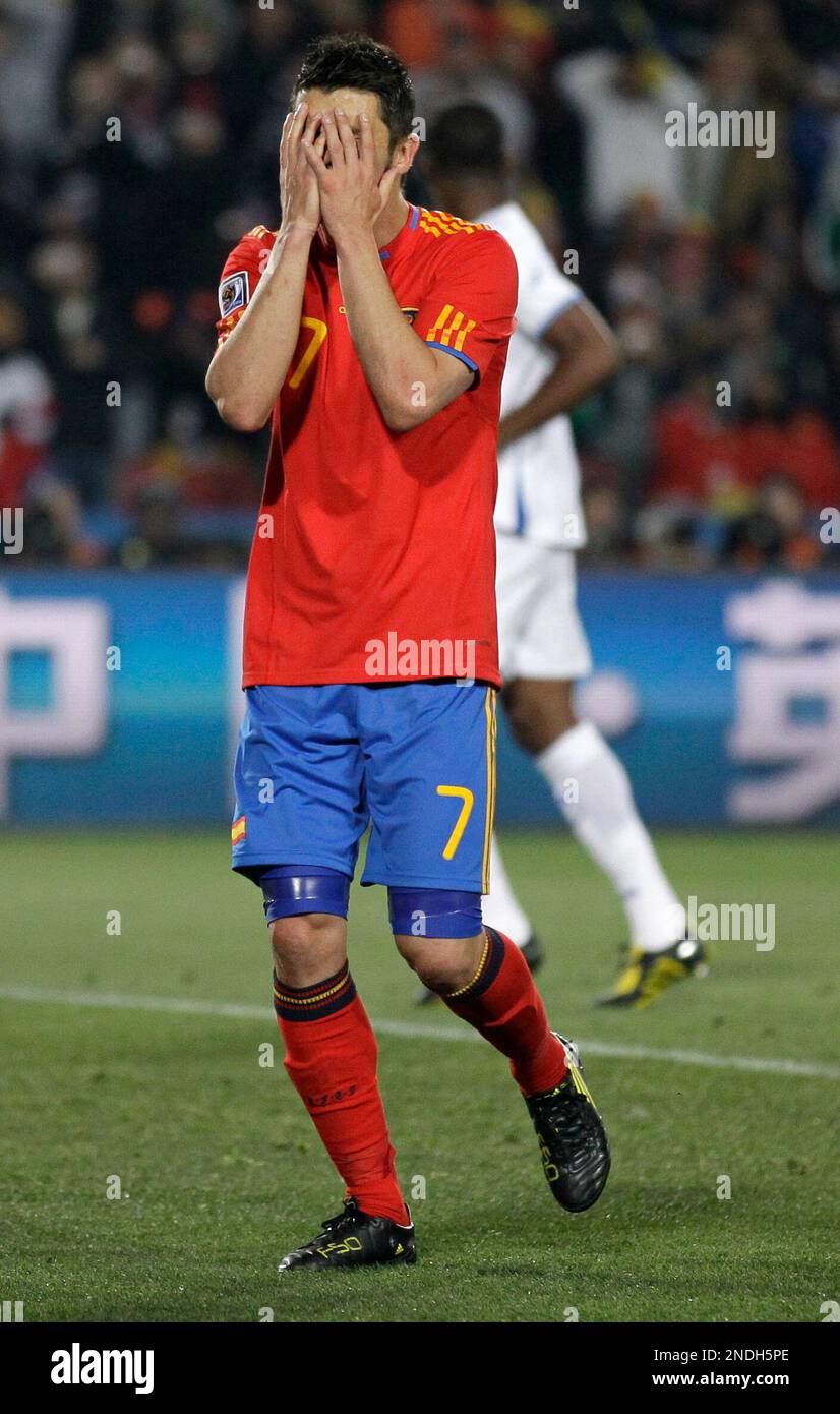 Spain's David Villa reacts after failing to score on a penalty during ...