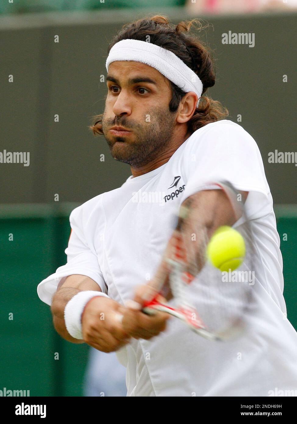 Argentina's Maximo Gonzalez makes a backhand return during his match ...