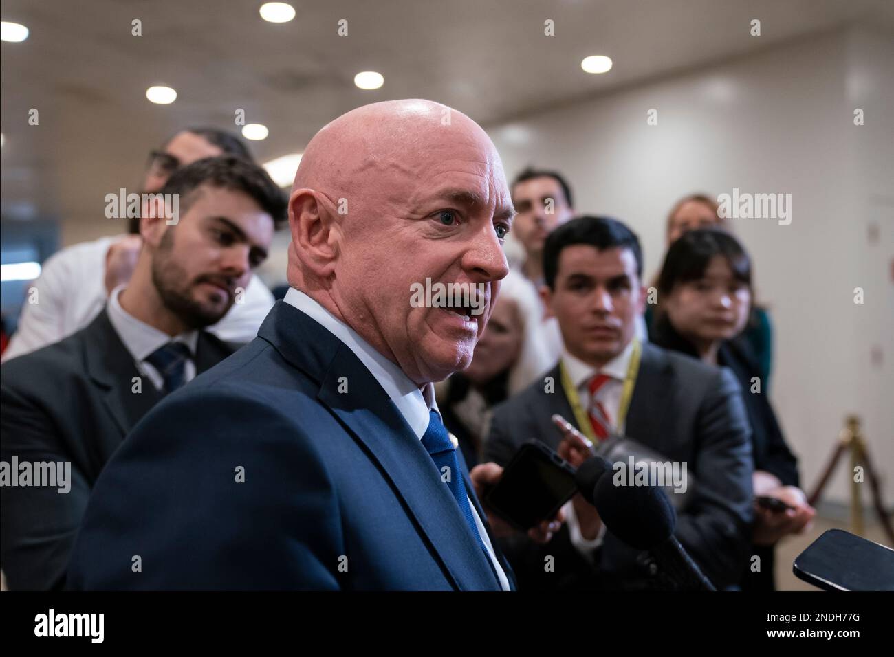 Sen. Mark Kelly, D-Ariz., speaks with reporters following a classified ...