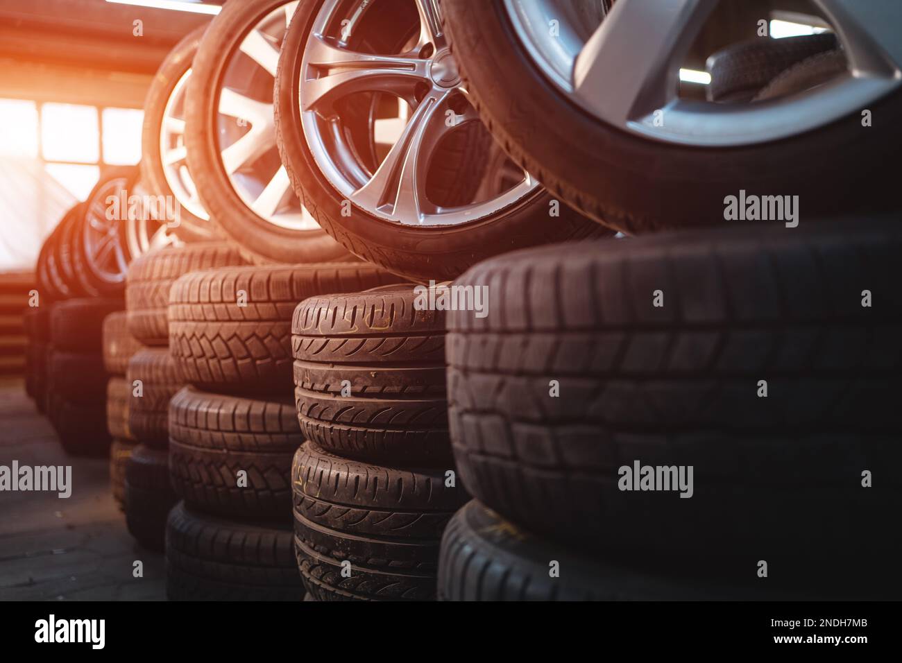 modern warehouse with stack of car tires Stock Photo - Alamy