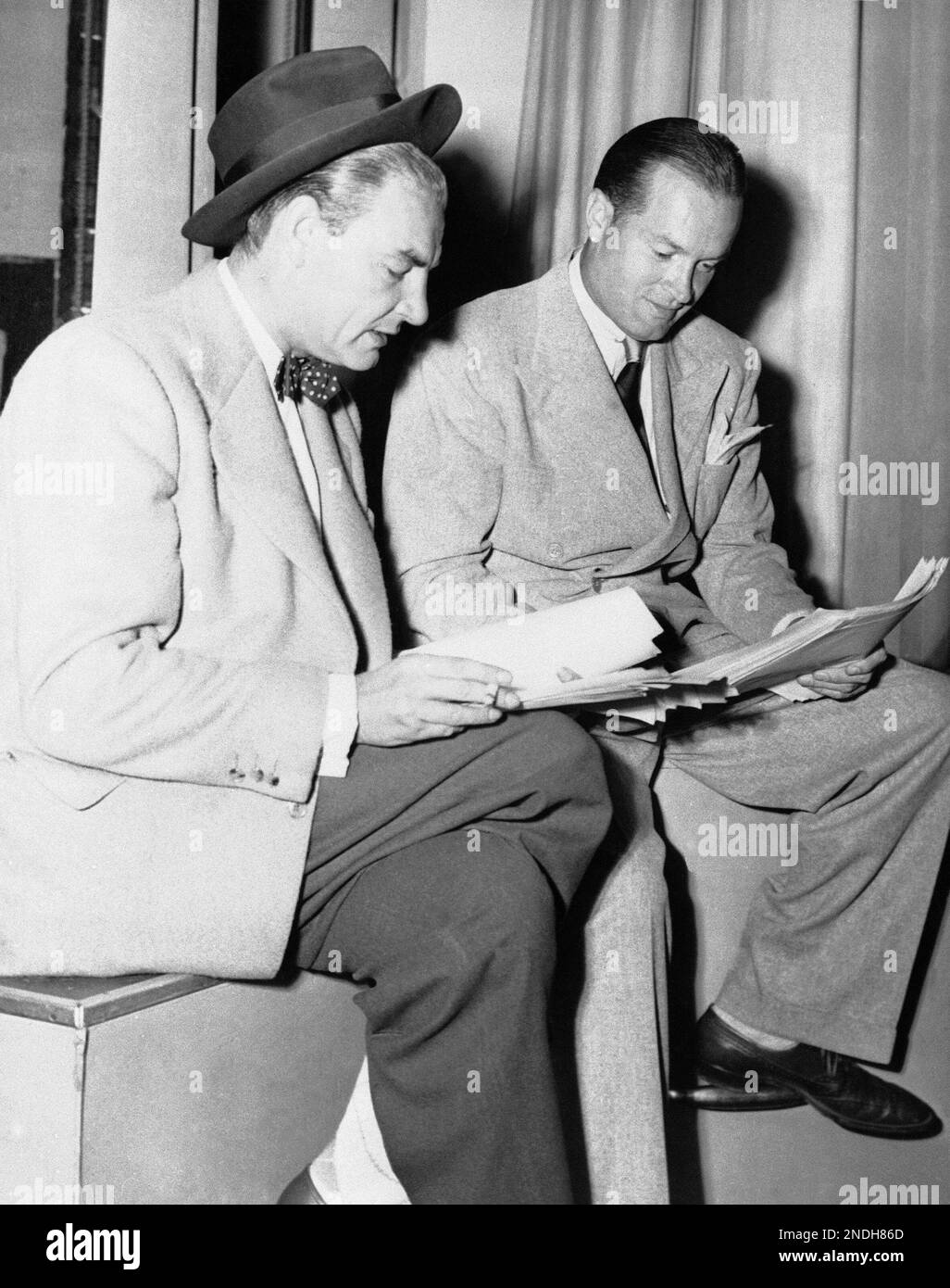 Ed “Archie” Gardner goes over a gag with Bob Hope prior to their ...