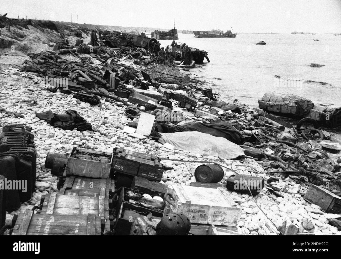 Wreckage and dead strewn along the beach, a grim reminder of the fury ...