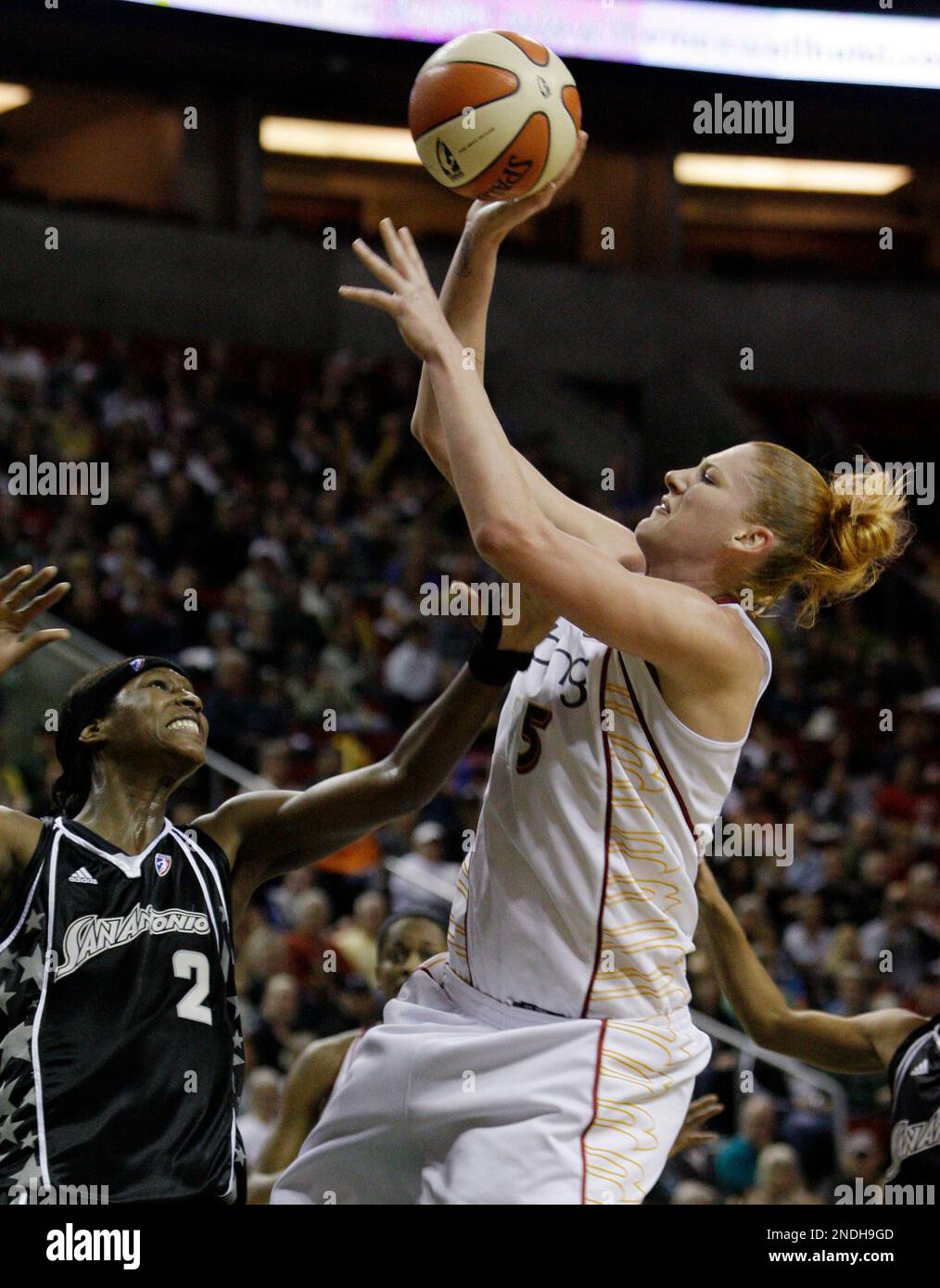 Seattle Storm's Lauren Jackson, right, shoots over San Antonio Silver ...