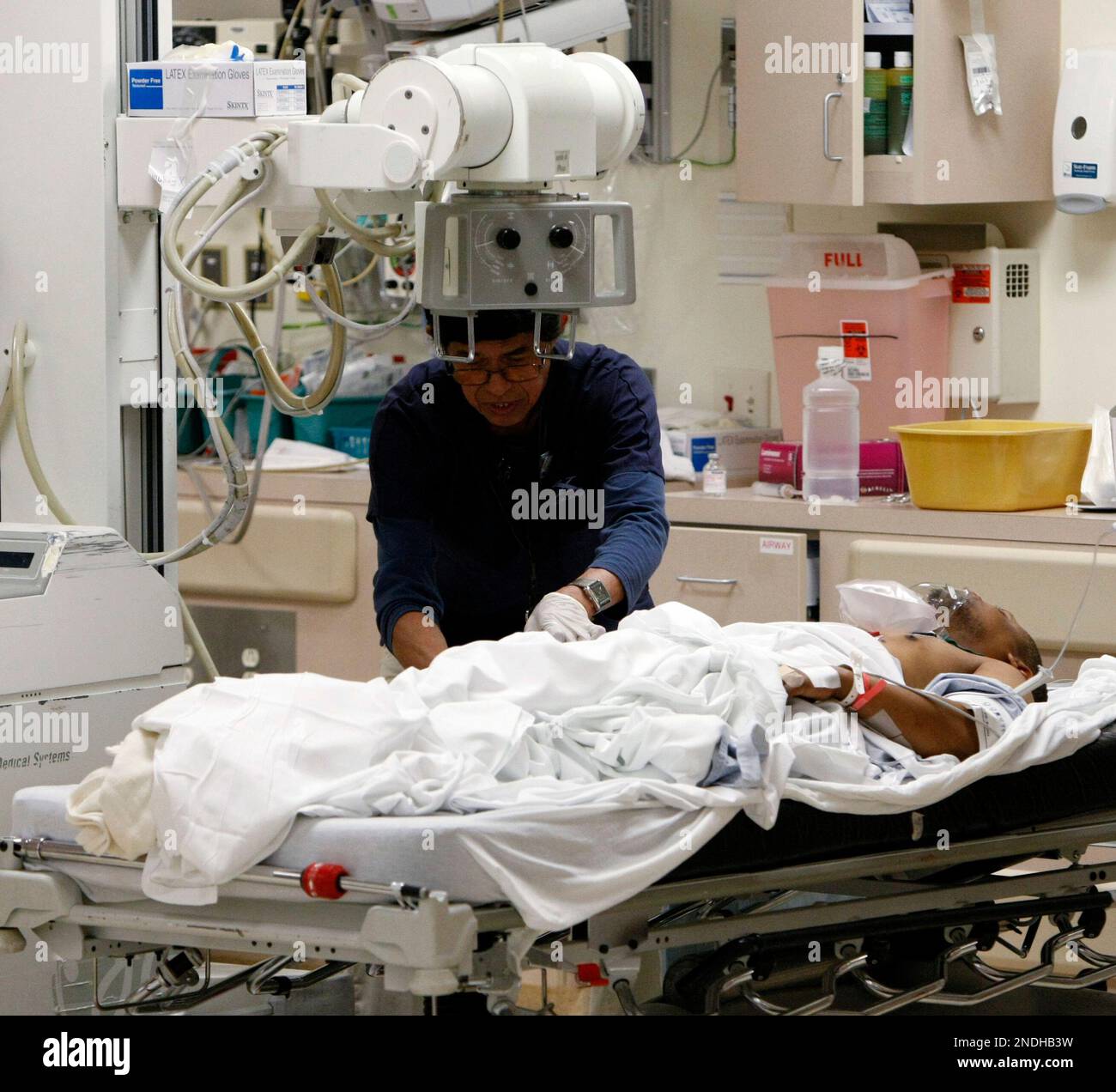 In this photo taken May 4, 2010 an X-Ray technician performs a series ...