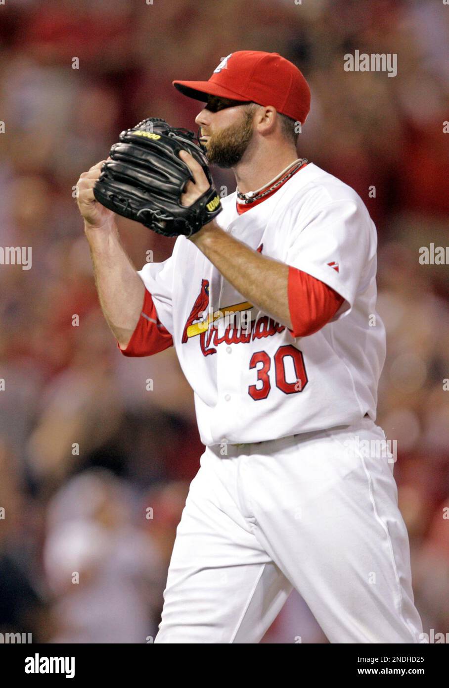 St. Louis Cardinals relief pitcher Jason Motte (30) celebrates after ...
