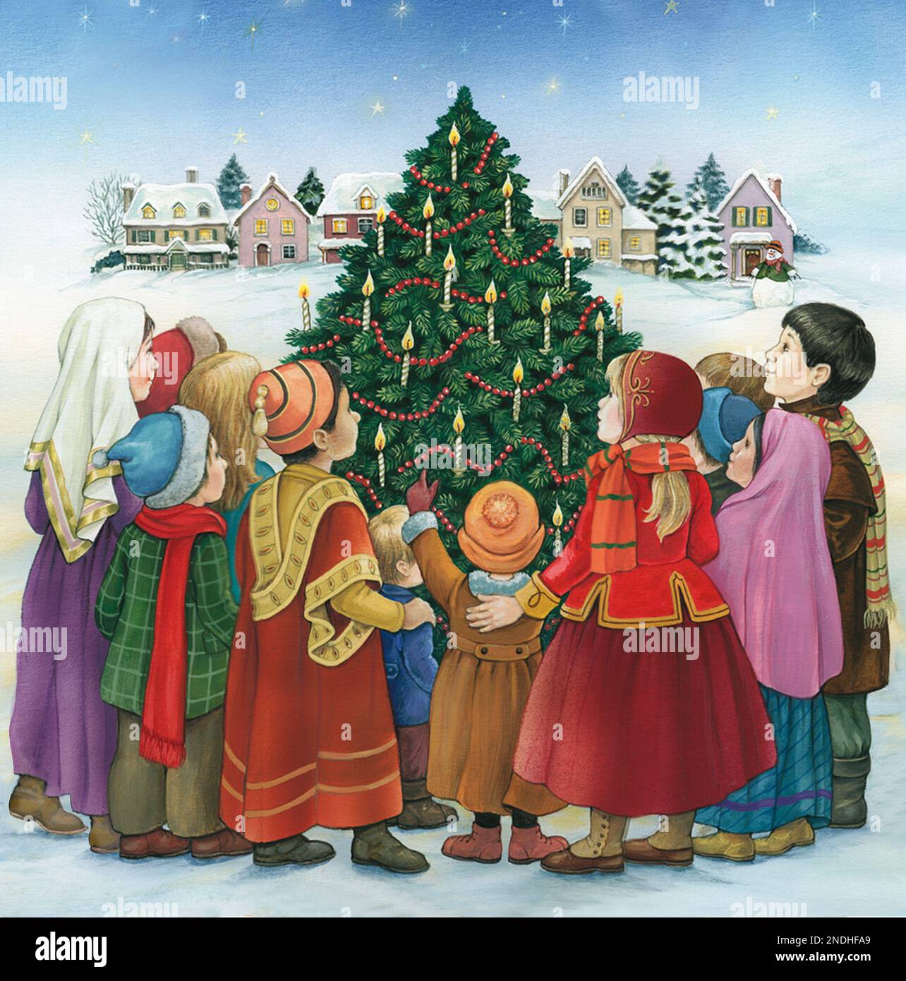 Multi cultural children around Christmas tree in village snow scene ...