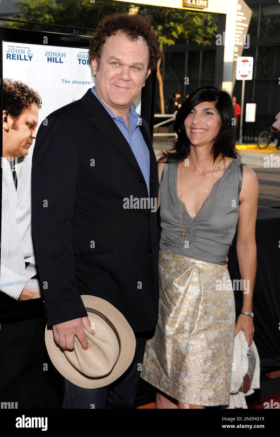 Actor John C. Reilly, left, and his wife, Alison Dickey arrive at the ...
