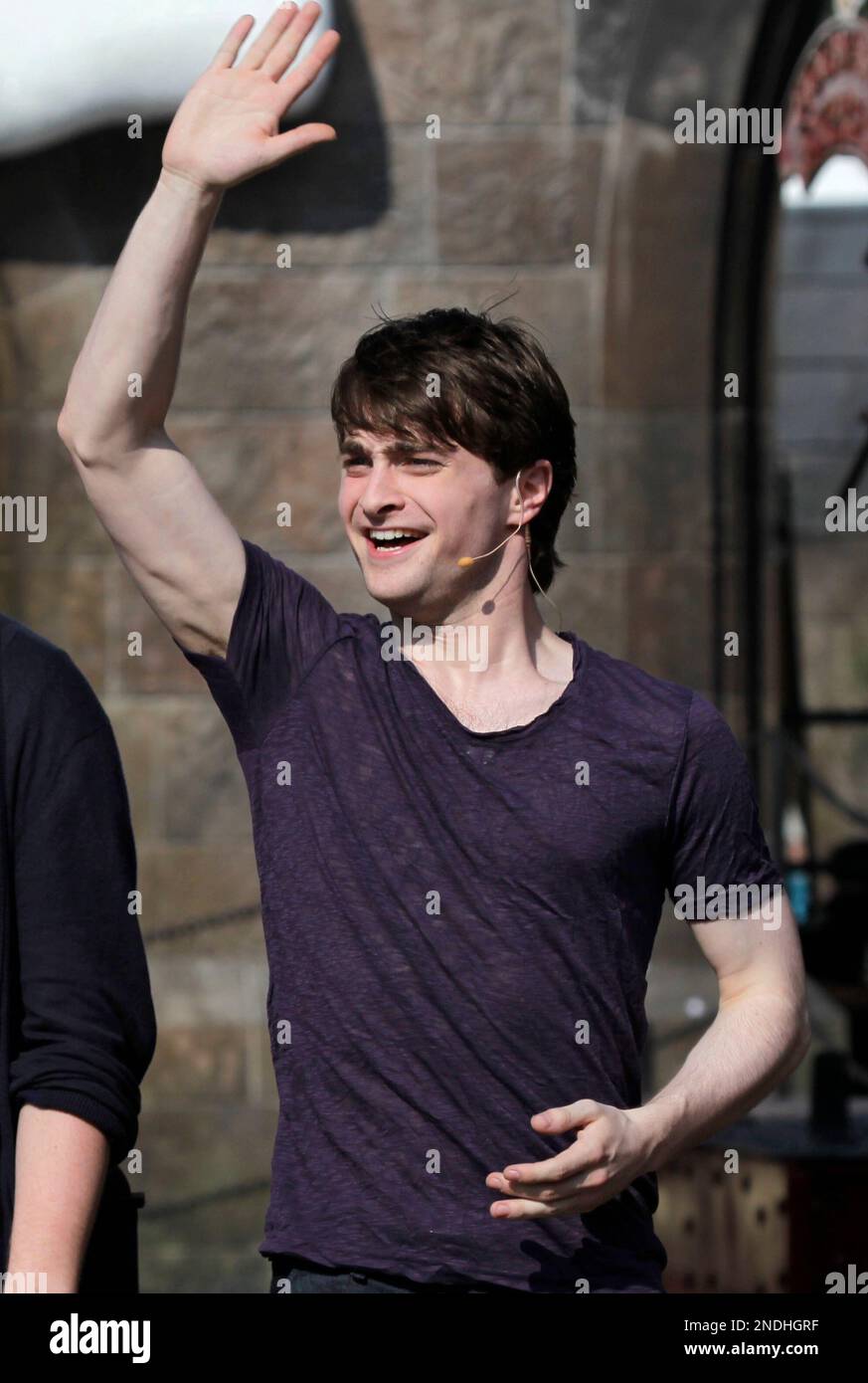 Actor Daniel Radcliffe welcomes guests during grand opening ceremonies of the Wizarding World of ...