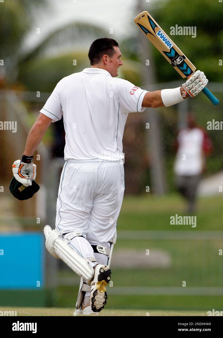 South Africa's captain Graeme Smith raises his bat after scoring a ...