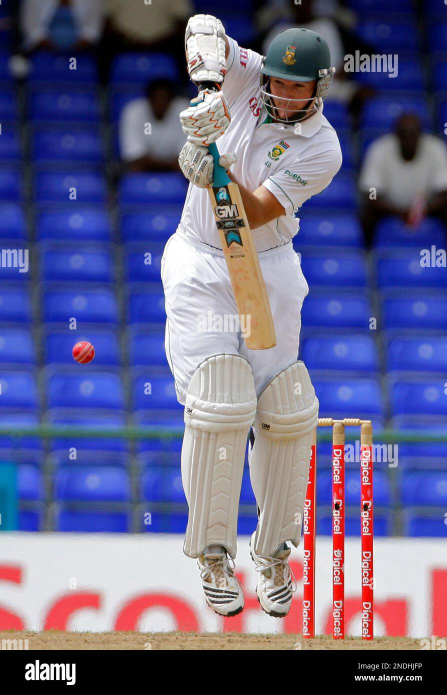 South Africa's captain Graeme Smith drives a ball on day one of the ...