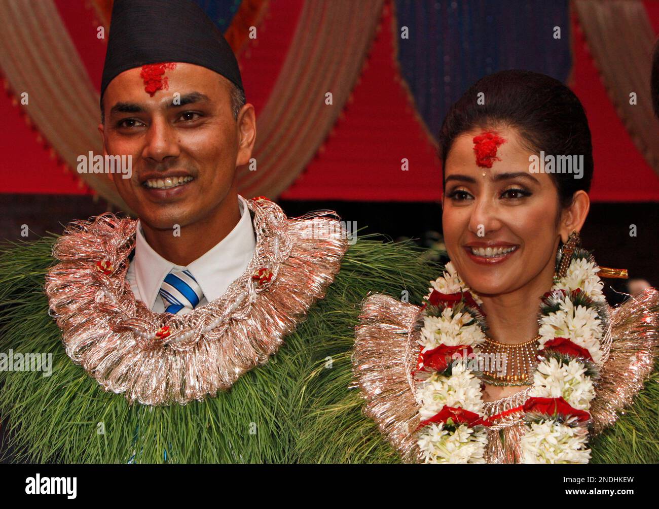Bollywood actress Manisha Koirala, right, poses for photographs with ...