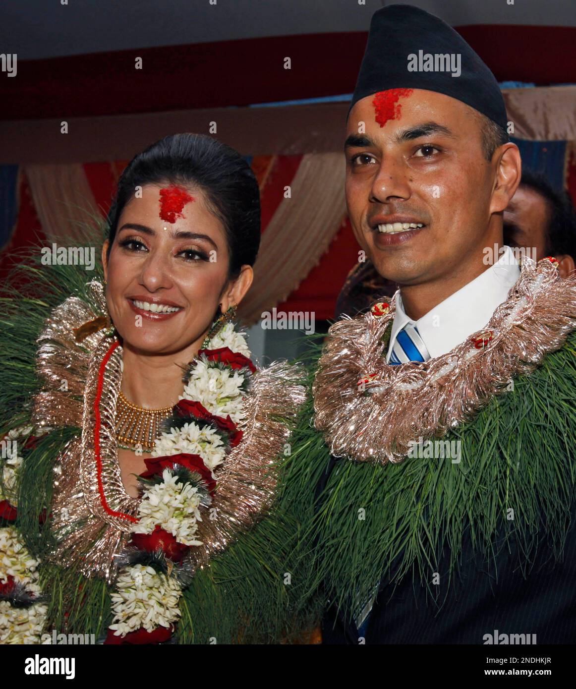 Bollywood actress Manisha Koirala, left, poses for photographs with the ...