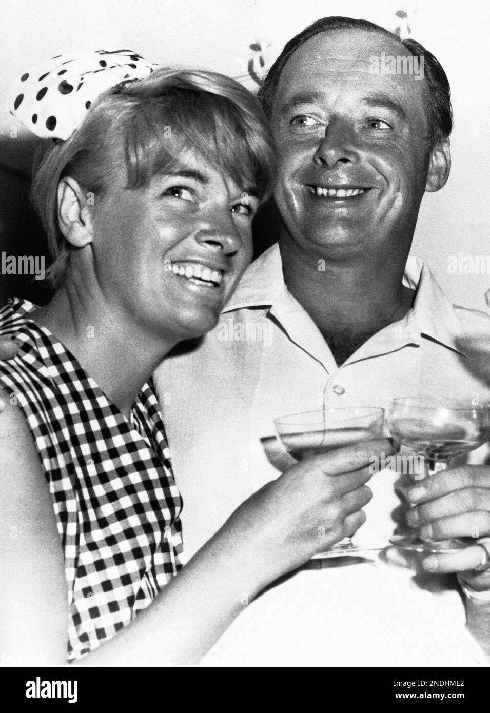 Donald Campbell and his wife Tonia Bern drink a toast in champagne on ...