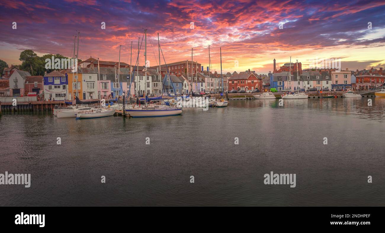 Harbour in town of Weymouth, UK. Fishing harbour at sunset in Weymouth ...