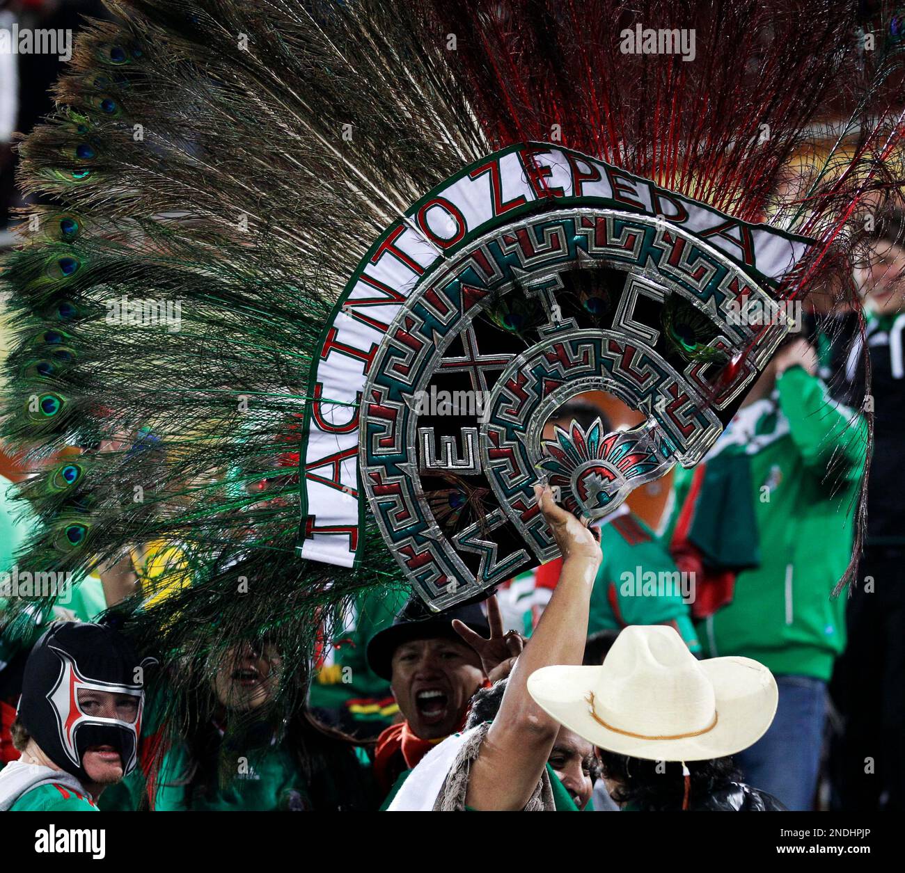 Mexican fans celebrate after their team won the World Cup group A ...