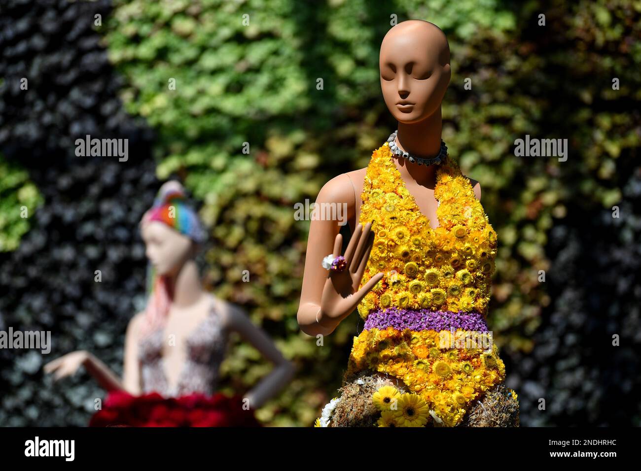 Mannequins dressed in floral arrangements are seen during Fleurs de ...