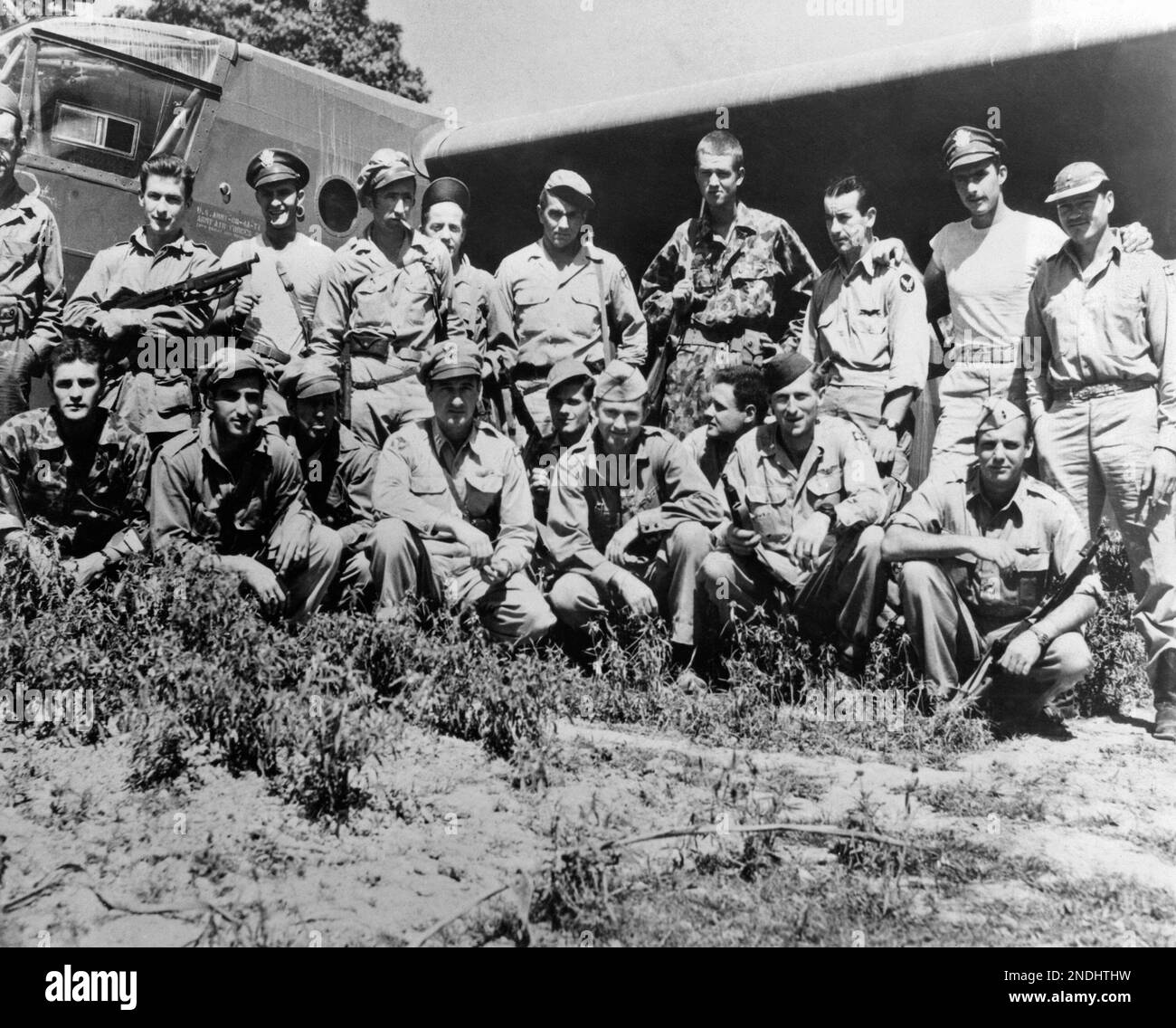 Flight Officer Jackie Coogan (kneeling, far right) is among this group ...