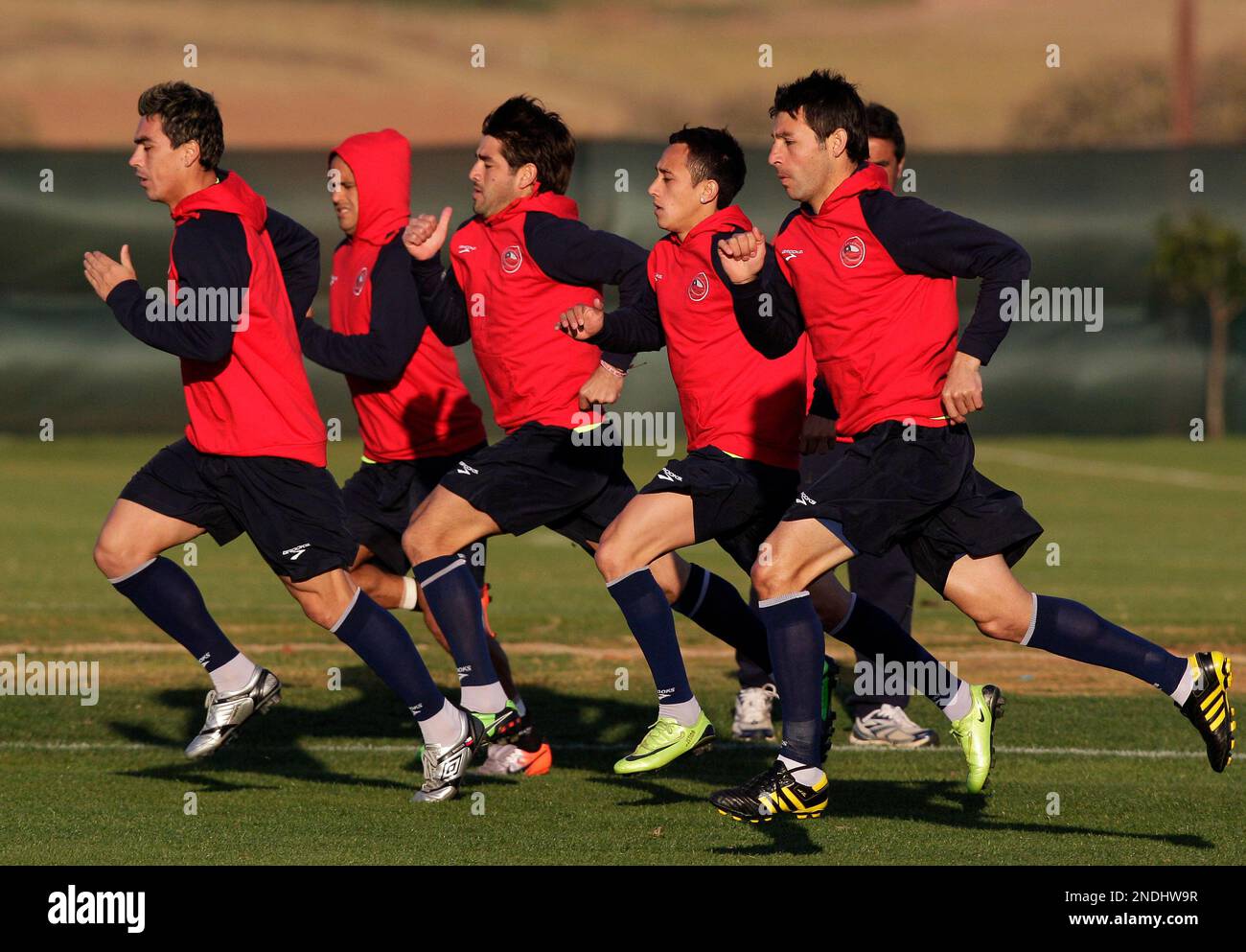 Chile's national soccer players run during a team training session at ...