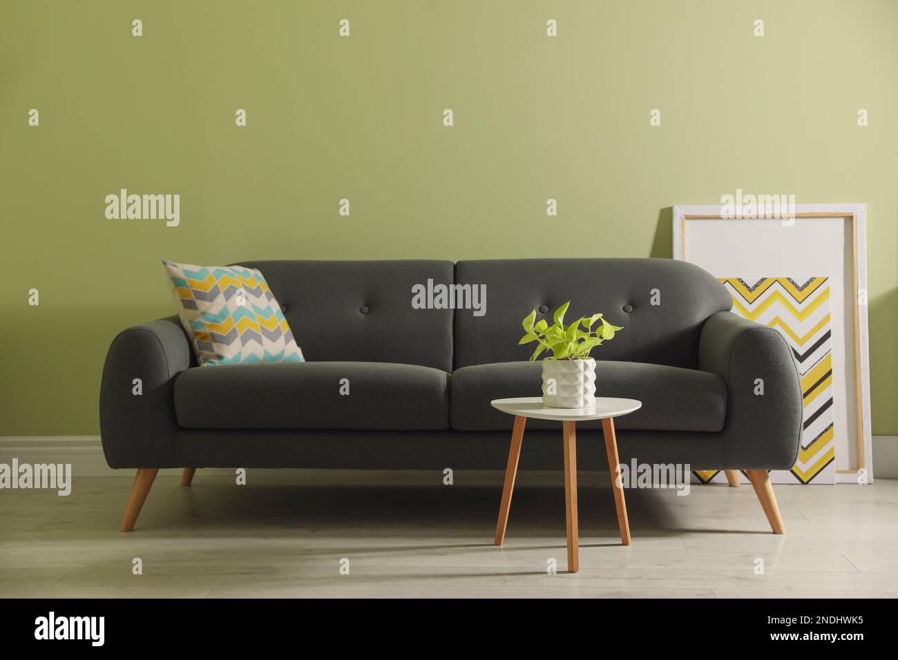 Stylish comfortable sofa in room. Interior design Stock Photo - Alamy