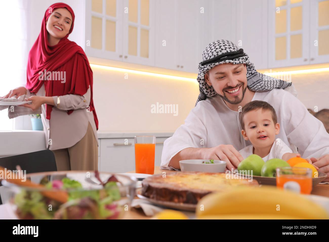 Muslim family dinner hi-res stock photography and images - Alamy