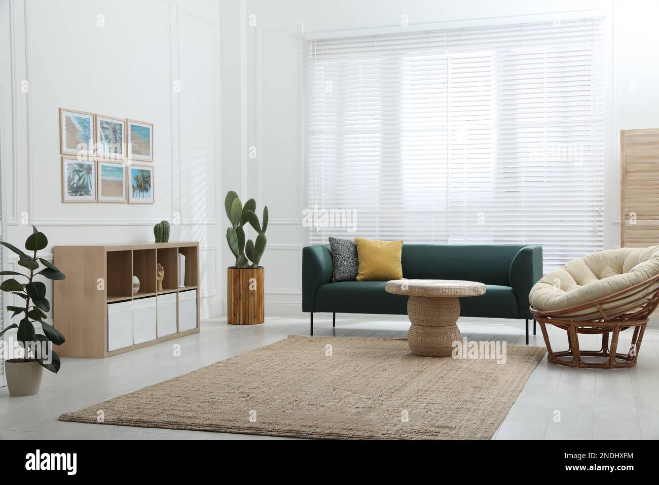Comfortable sofa in modern living room. Interior design Stock Photo - Alamy