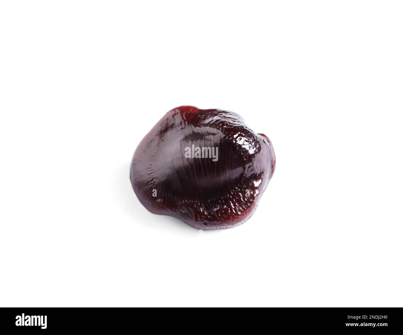 One brown tamarind seed on white background Stock Photo - Alamy