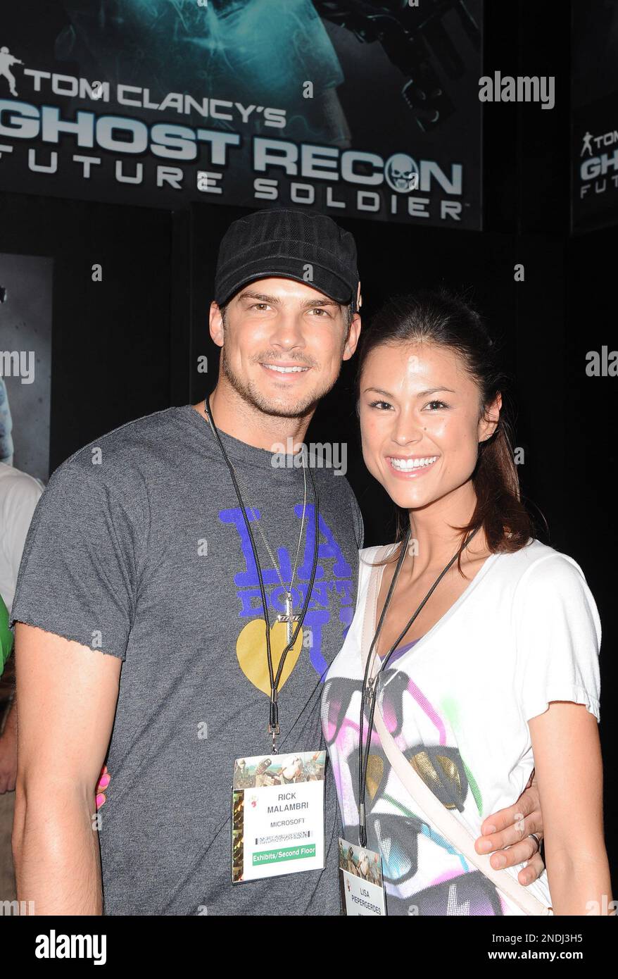 Rick Malambri, left, and Lisa Piepergerdes at the Ubisoft Booth at the ...