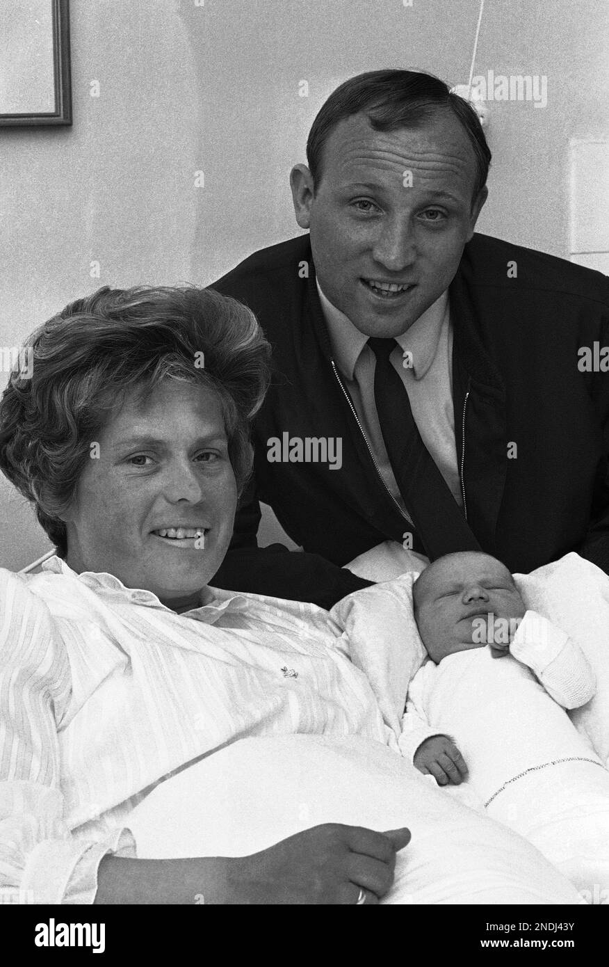 German soccer star Uwe Seeler poses with his wife Ilka and his new born ...