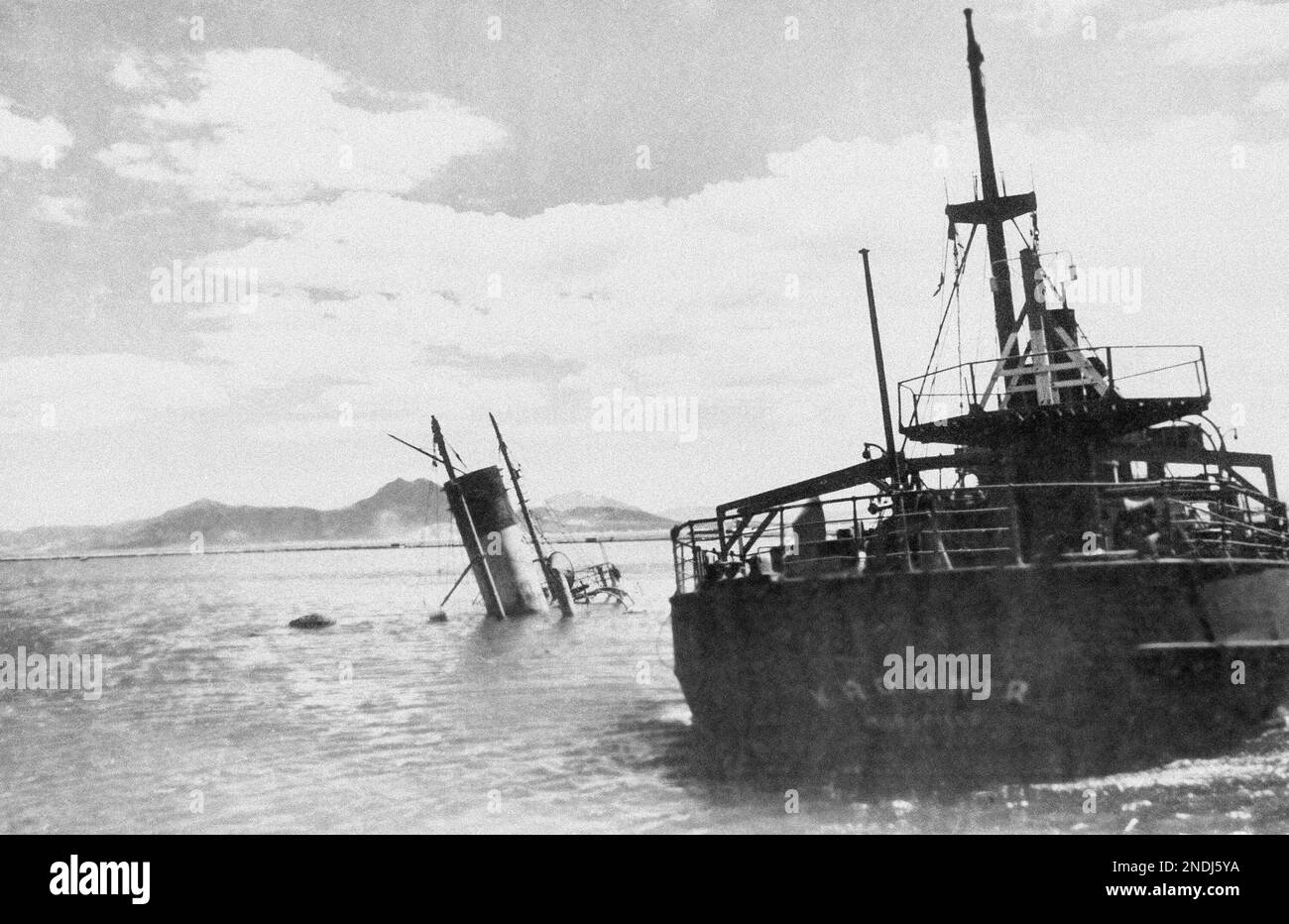 Sunken and damaged ships in the harbour in Tunis, May 19, 1943. The ...