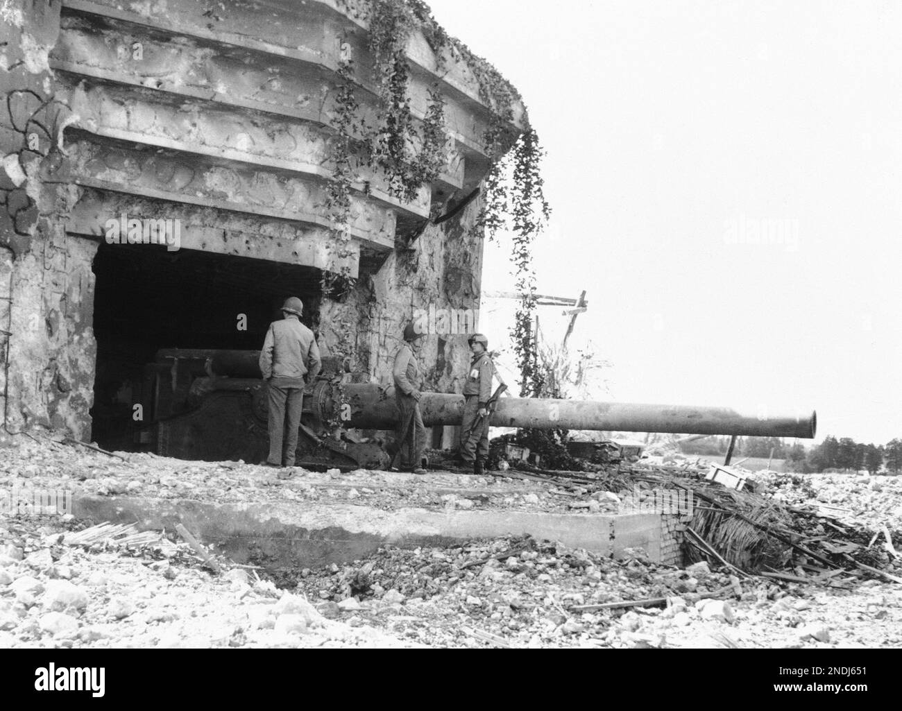 A view of an oversized German naval gun which failed to protect this ...