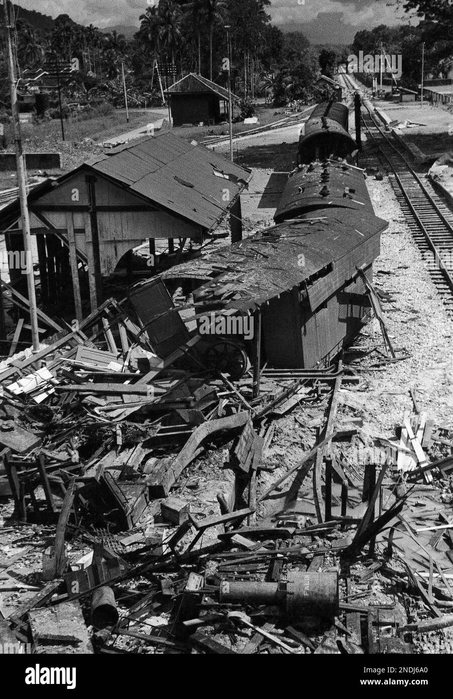 A bombed-and machine-gunned train in North-West Malaya, April 27, 1942 ...