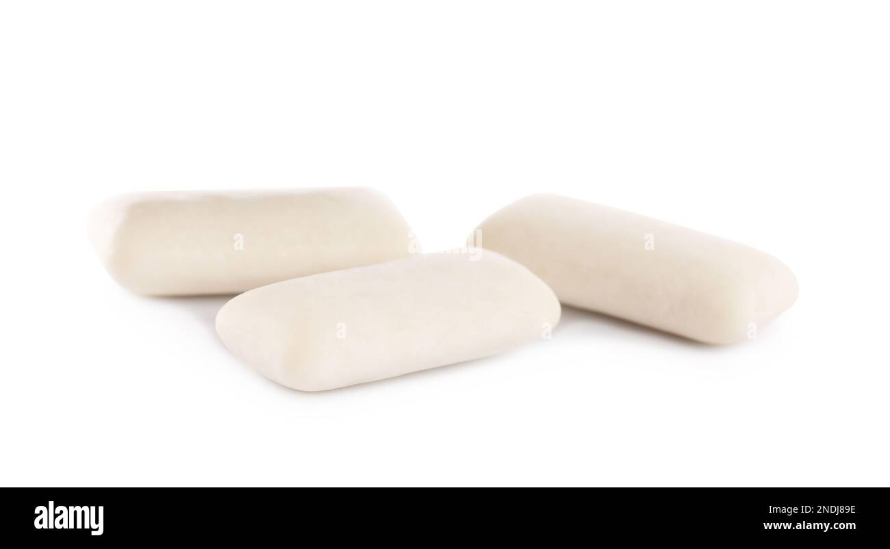 Three sweet chewing gum pieces on white background Stock Photo - Alamy