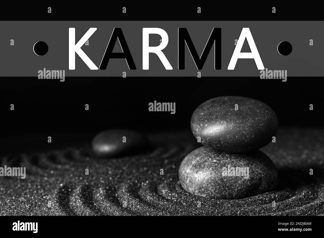Karma concept. Black sand and stones against dark background Stock ...