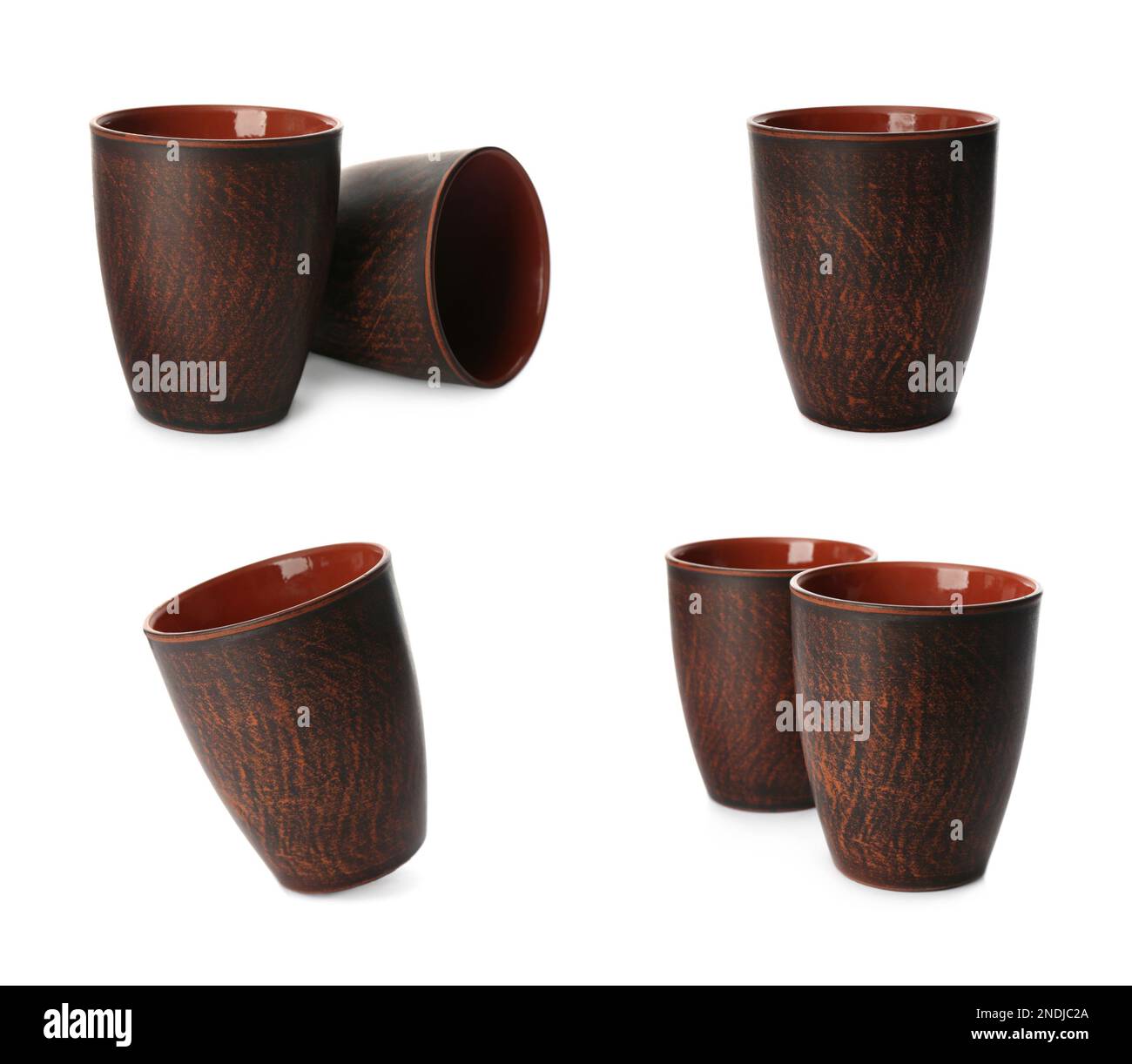 Set with clay cups on white background Stock Photo - Alamy
