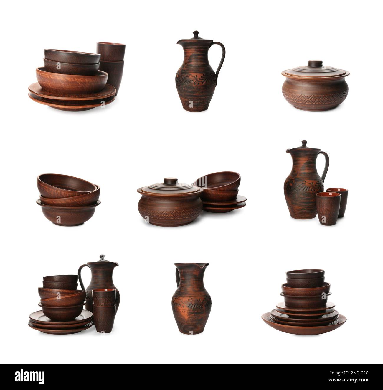 Set with clay dishes on white background Stock Photo - Alamy