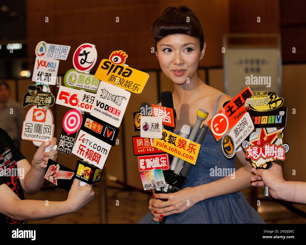 Hong Kong actress Fiona Sit talks to reporters at a premiere of her new ...