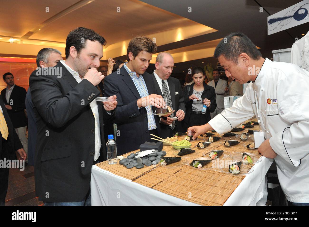 Chef Nobu Matsuhisa serves out of the FIJI Water Kitchen at the "Silver ...