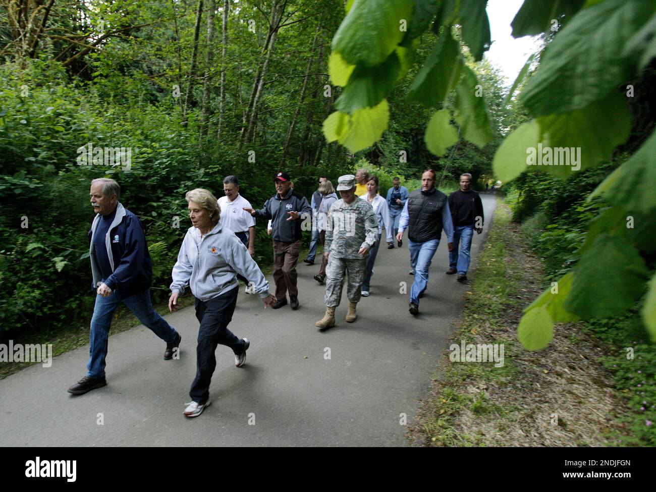 Washington Gov. Chris Gregoire, second from left, Peter Goldmark, left ...