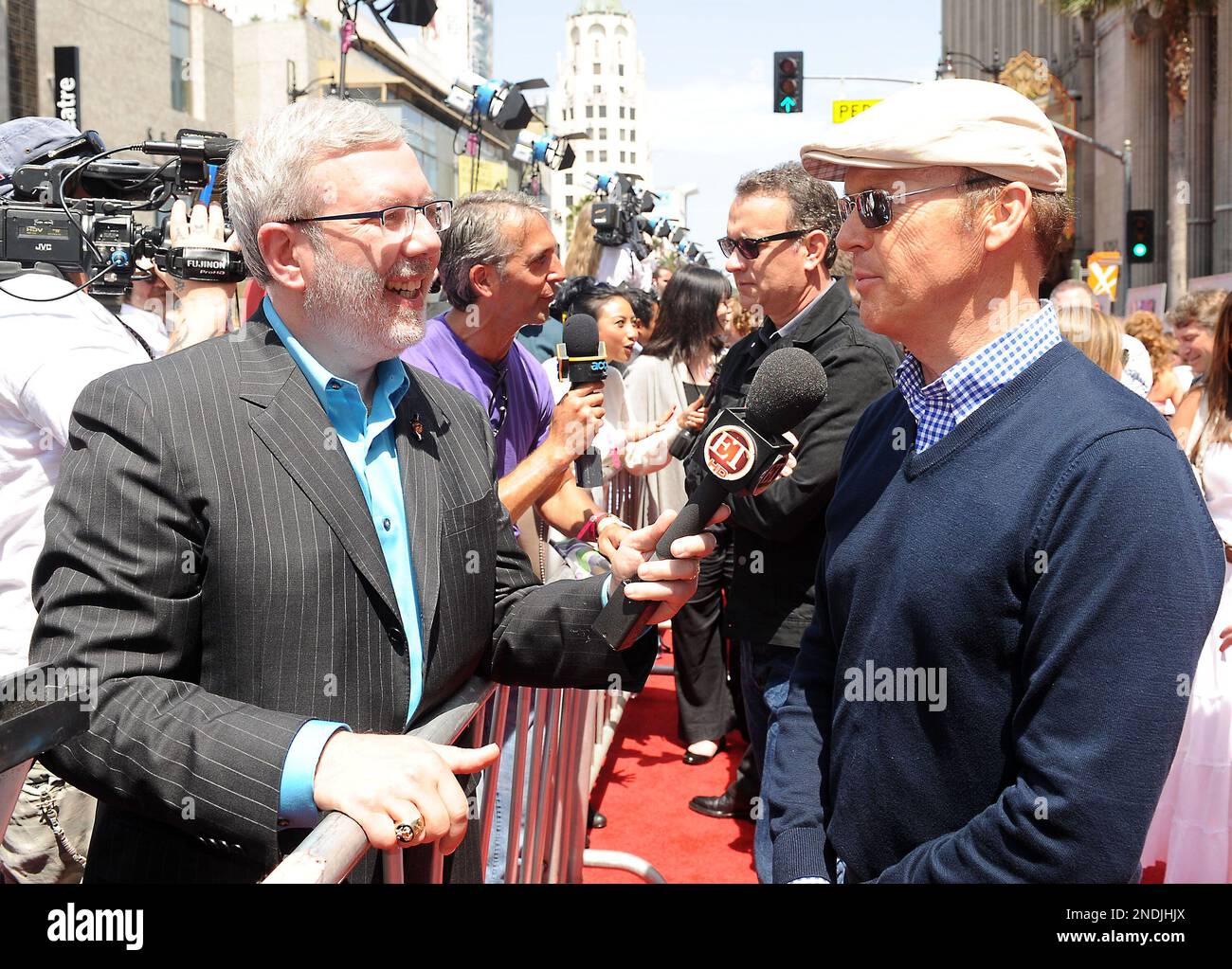 Leonard Maltin, at left, interviews Michael Keaton at the world ...