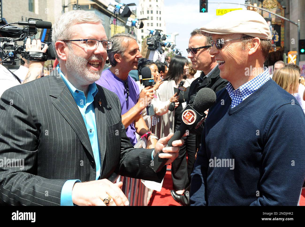 Leonard Maltin, at left, interviews Michael Keaton at the world ...