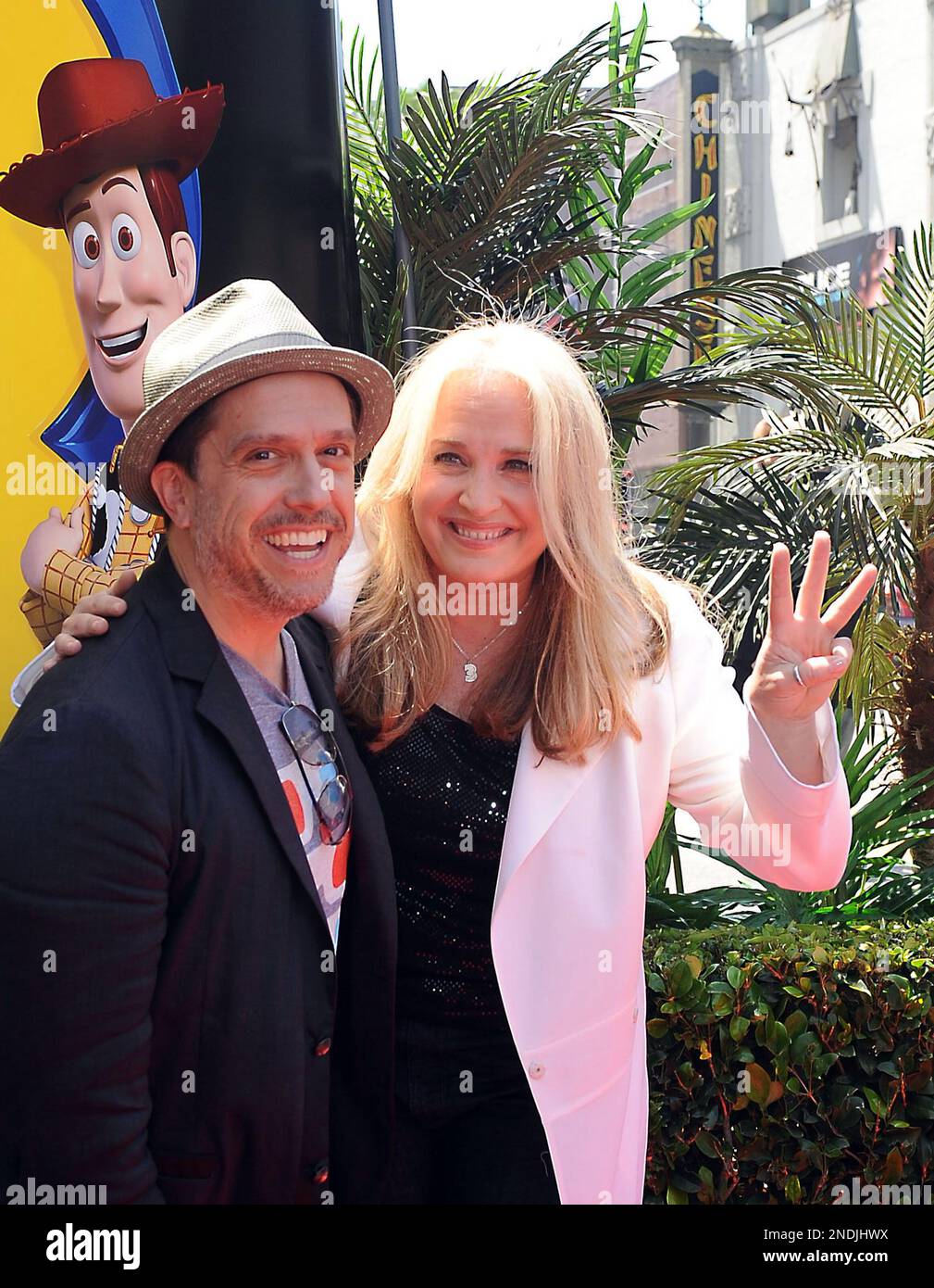 Darla K. Anderson, at right, and Lee Unkrich arrives at the world ...