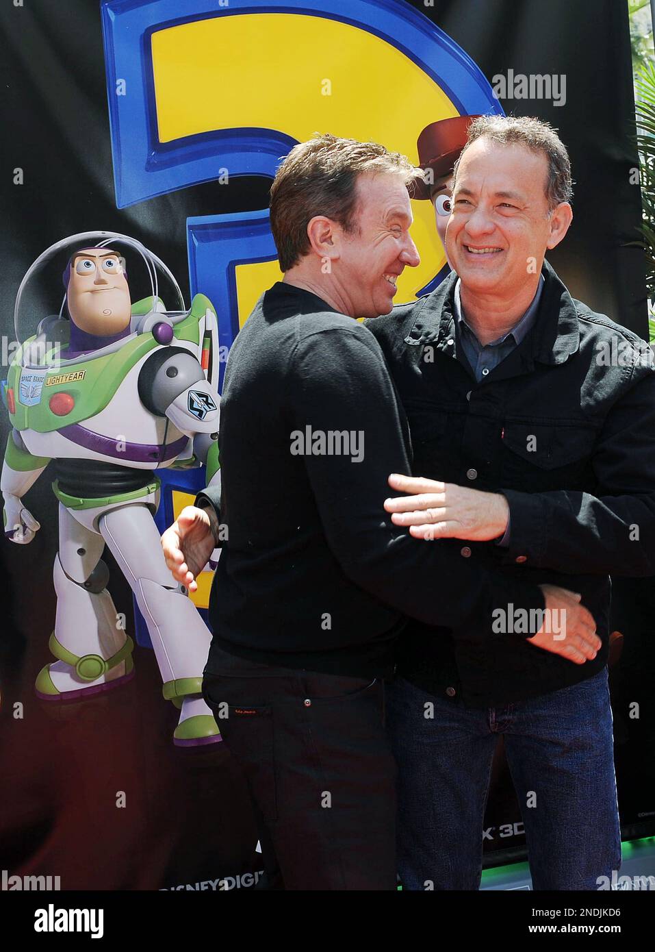 Tim Allen, left, and Tom Hanks arrive at the world premiere of Toy ...