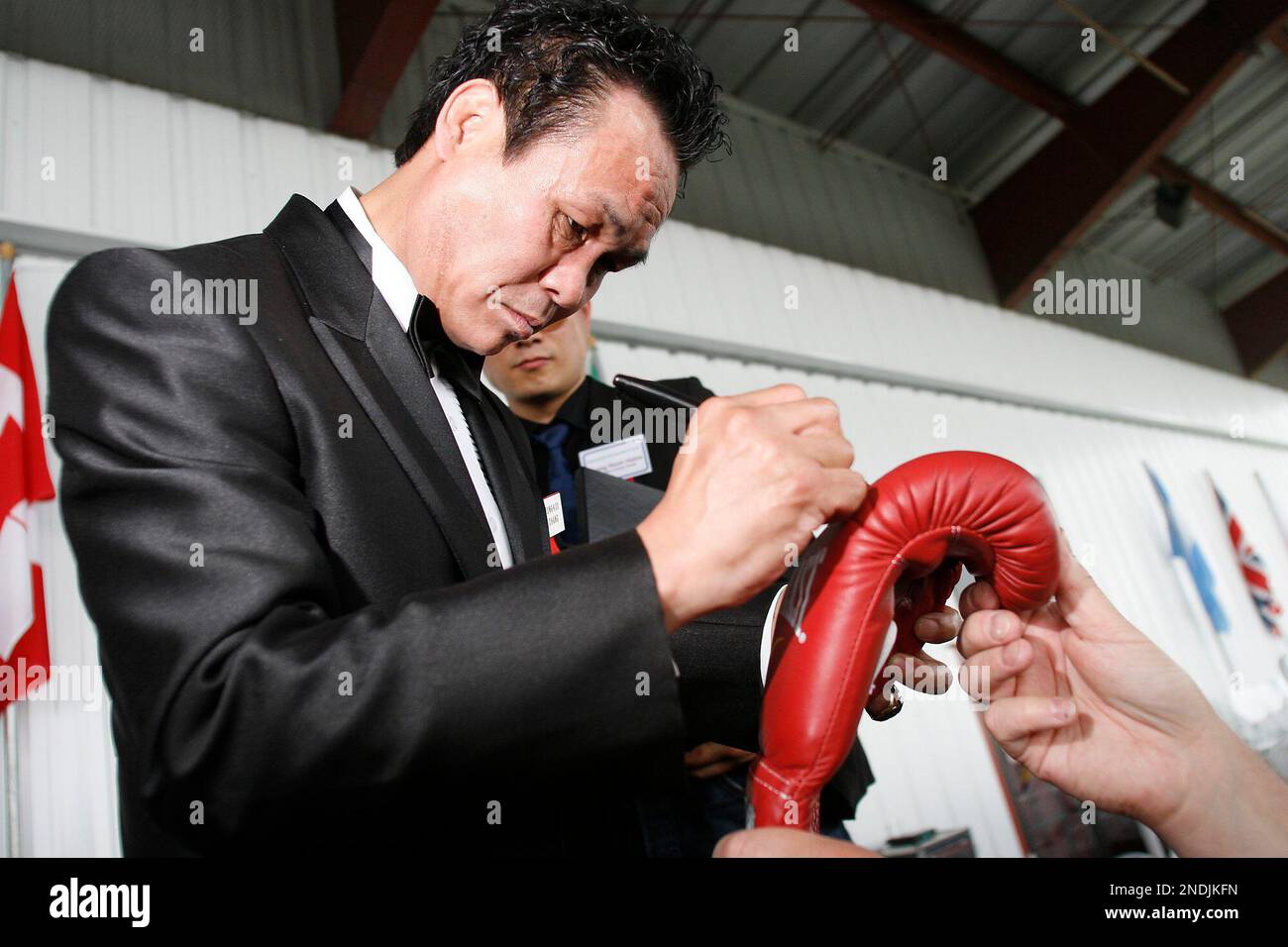 International Boxing Hall of Fame 2010 inductee Jung Koo Chang signs an ...