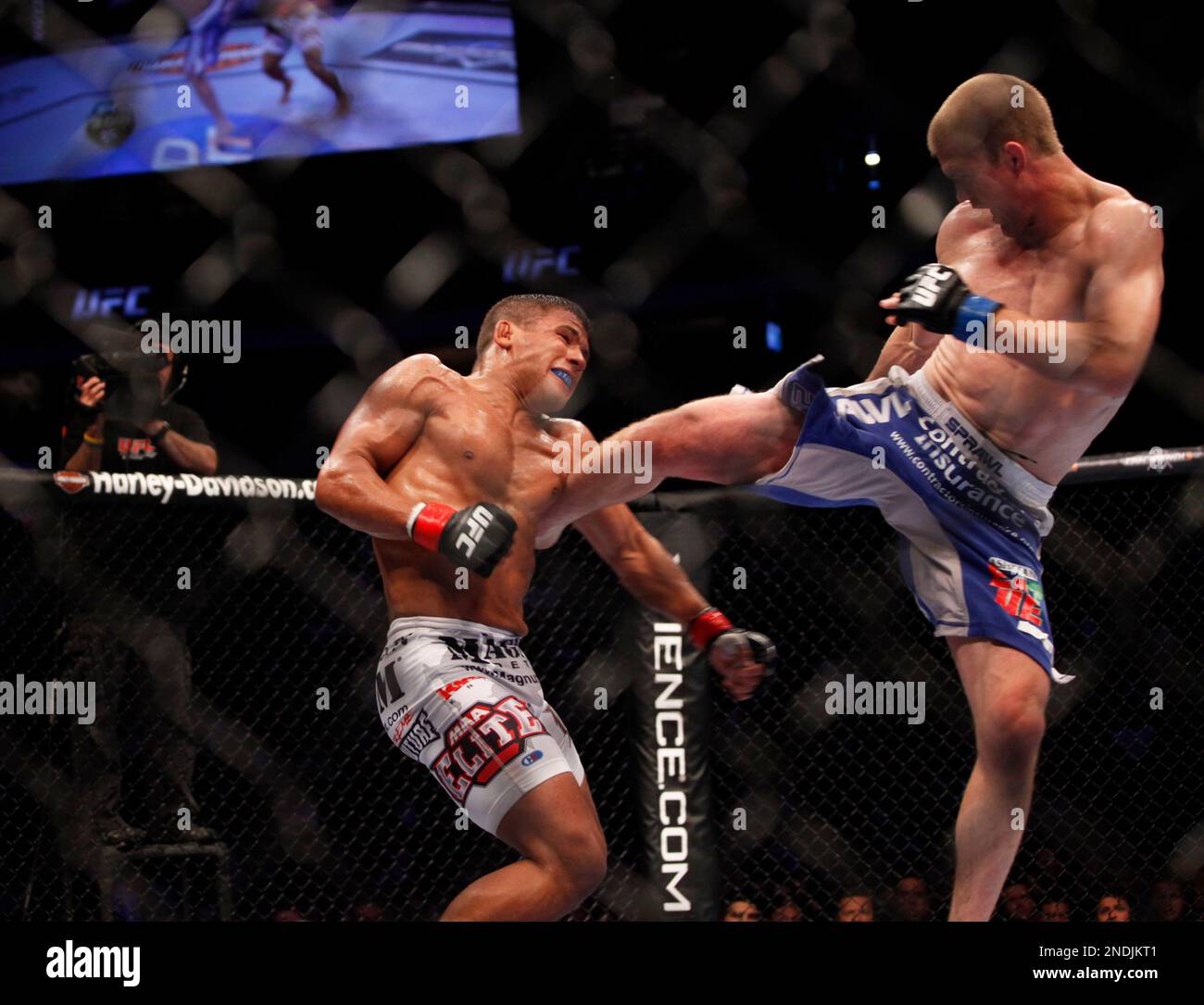 Evan Dunham beats during their UFC 115 lightweight mixed martial art ...